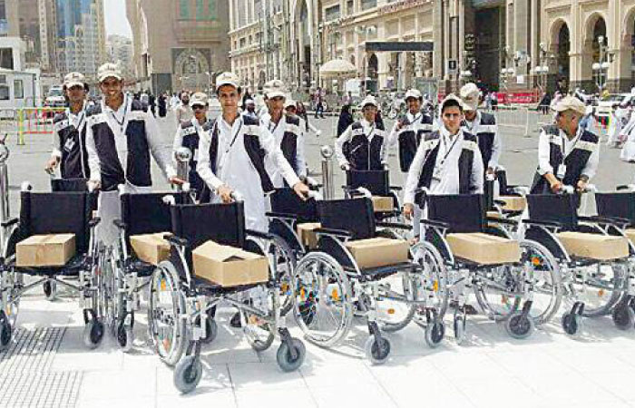 Wheelchair pushers of the Grand Mosque - Eye of Riyadh